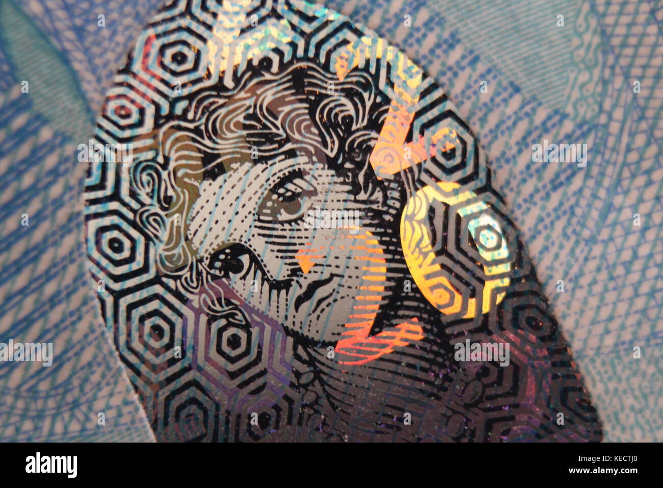 Macro close-up of euro bill with holographic Greek goddess Europa adorn ...