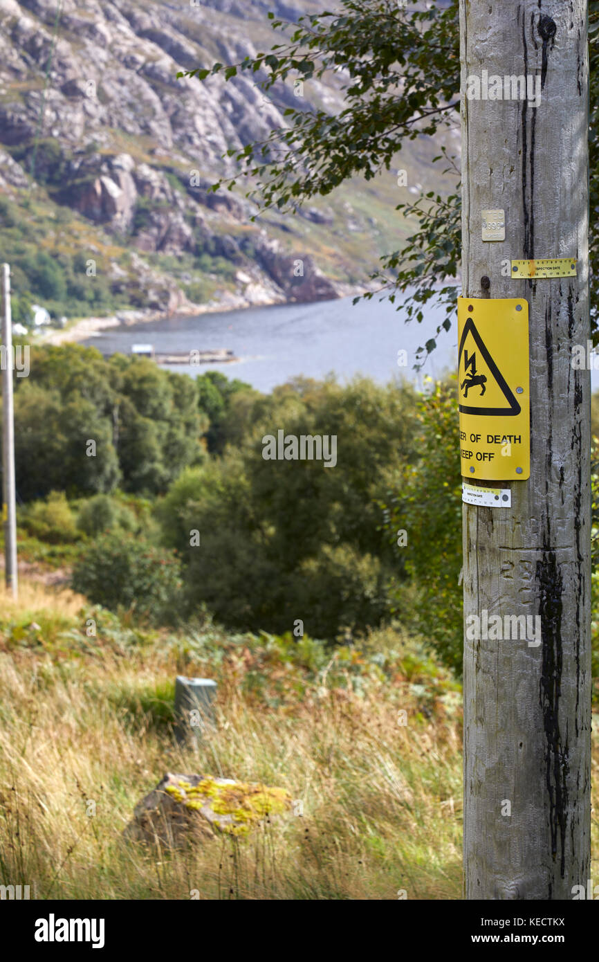 Danger sign on electric post hi-res stock photography and images - Alamy