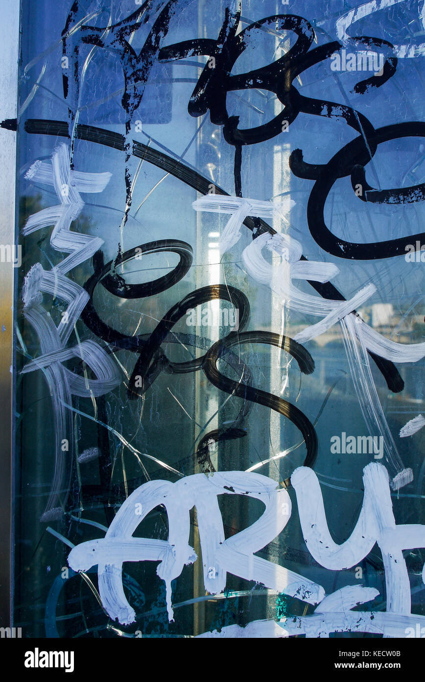 Graffitis on a glass plate, Paris, France Stock Photo - Alamy