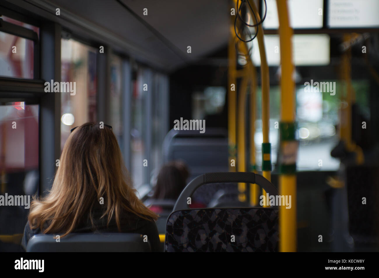 View from inside the bus with passengers Stock Photo - Alamy