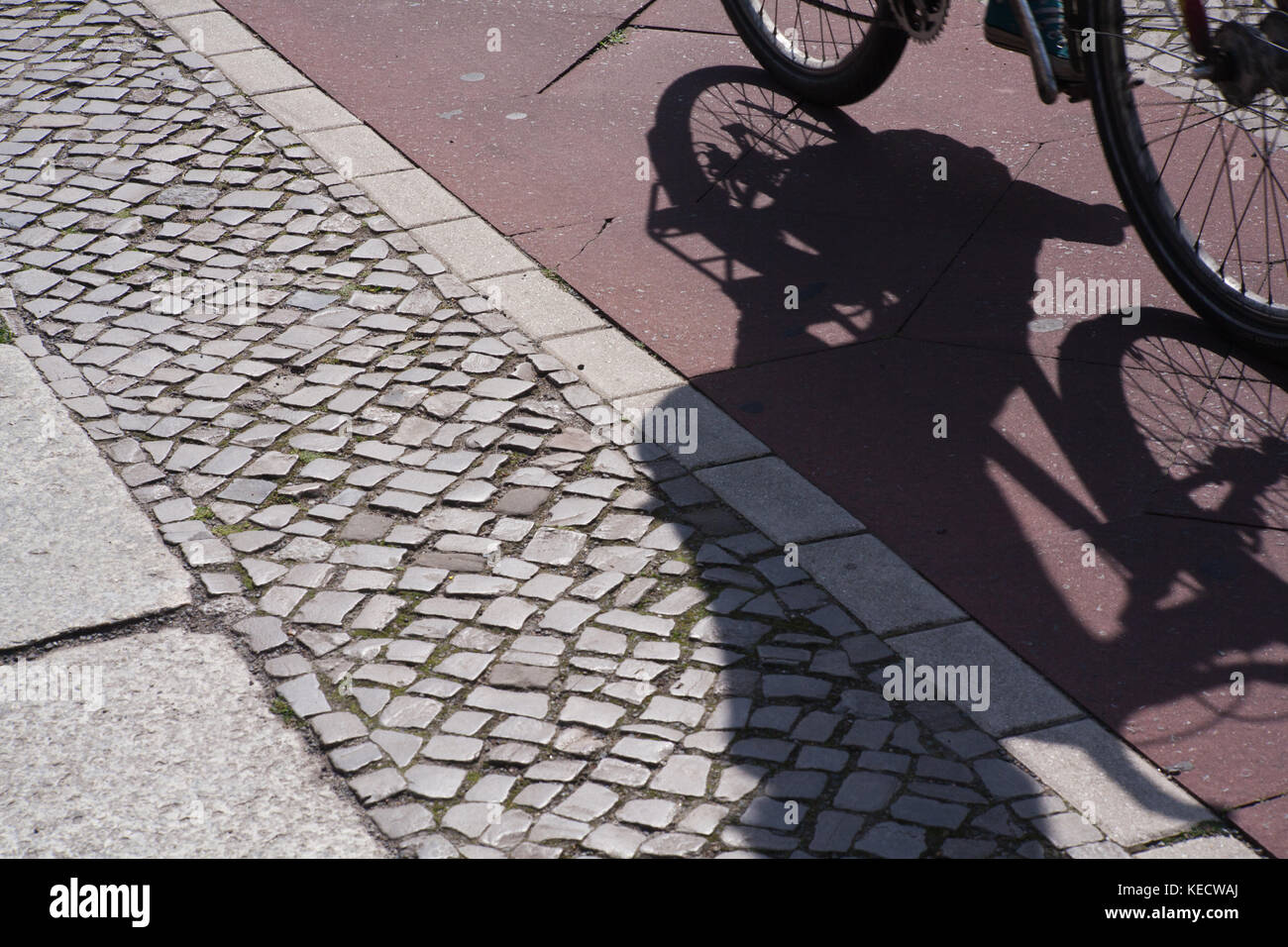 Cyclist shadow on bicycle hi-res stock photography and images - Alamy