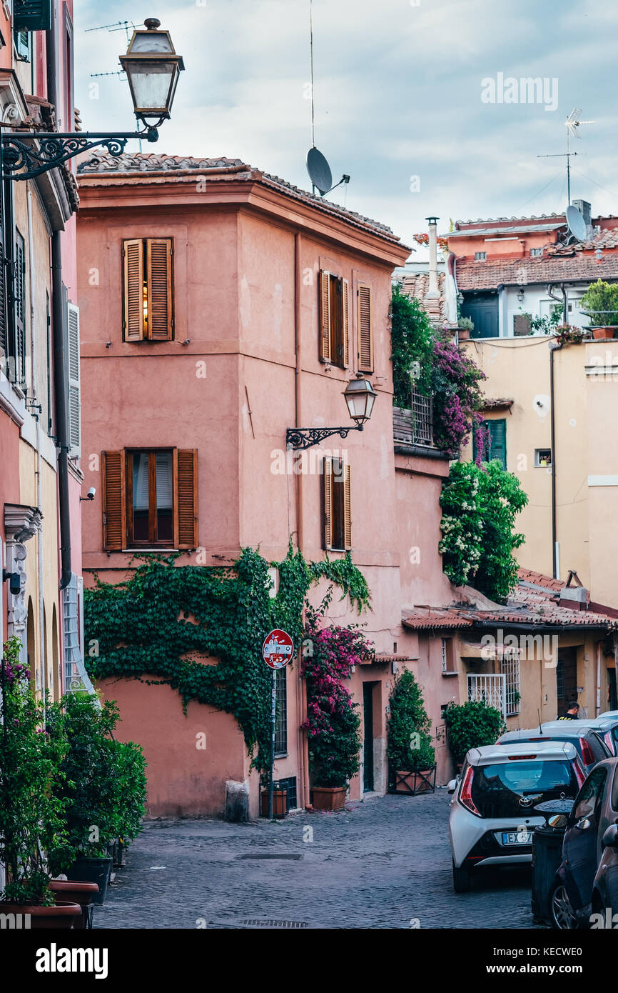 The charming, ivy-covered pink buildings of Rome, Italy's Trastevere ...