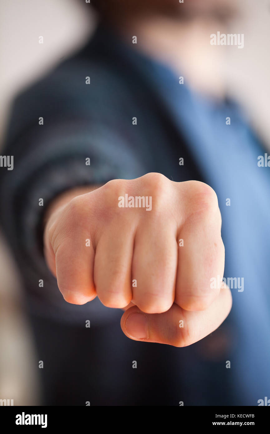 man give a punch, protecting herself. boxe fist. concept of defence ...