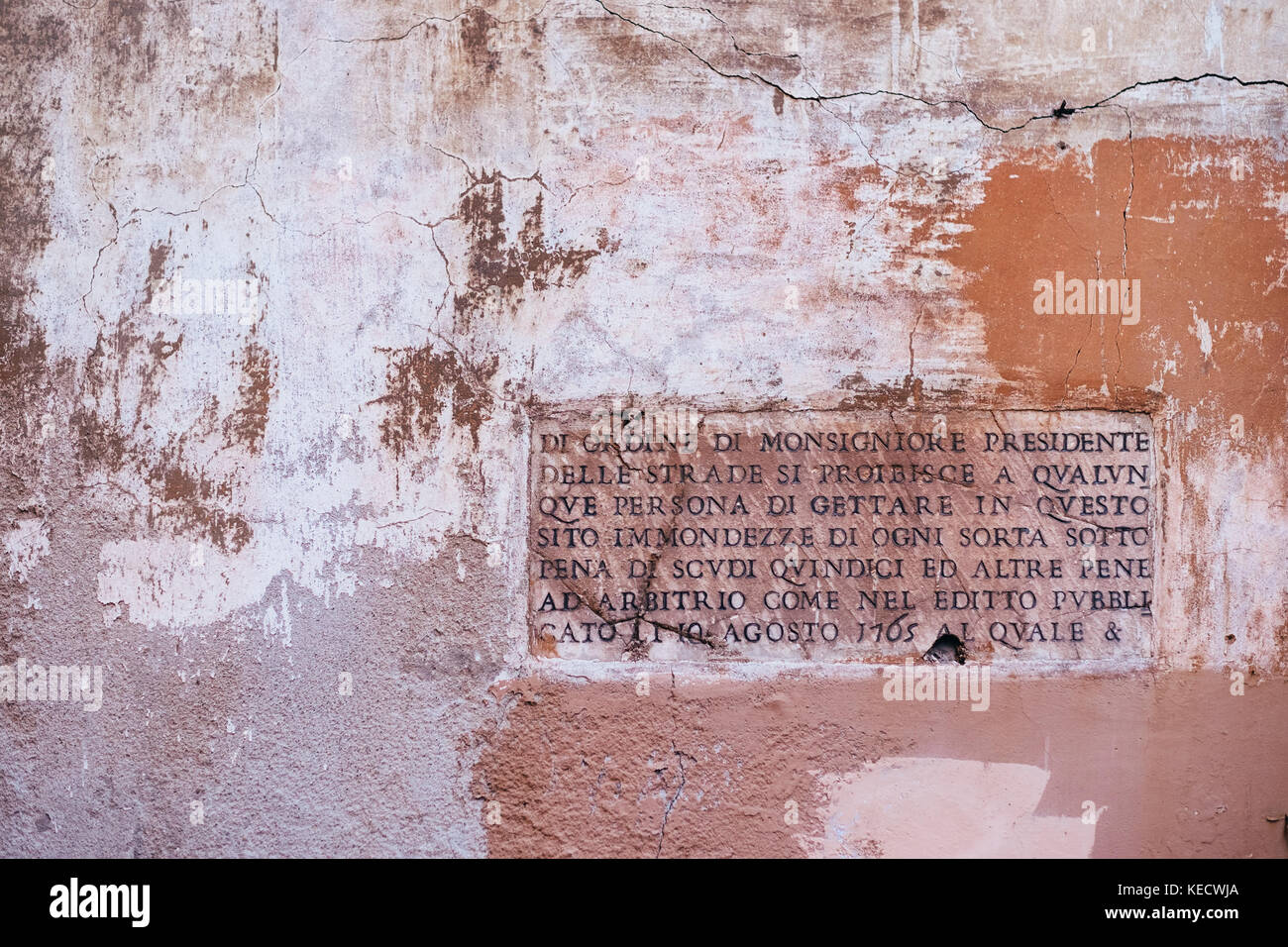 Detail from a building in Rome, Italy, where a historic sign describes ...