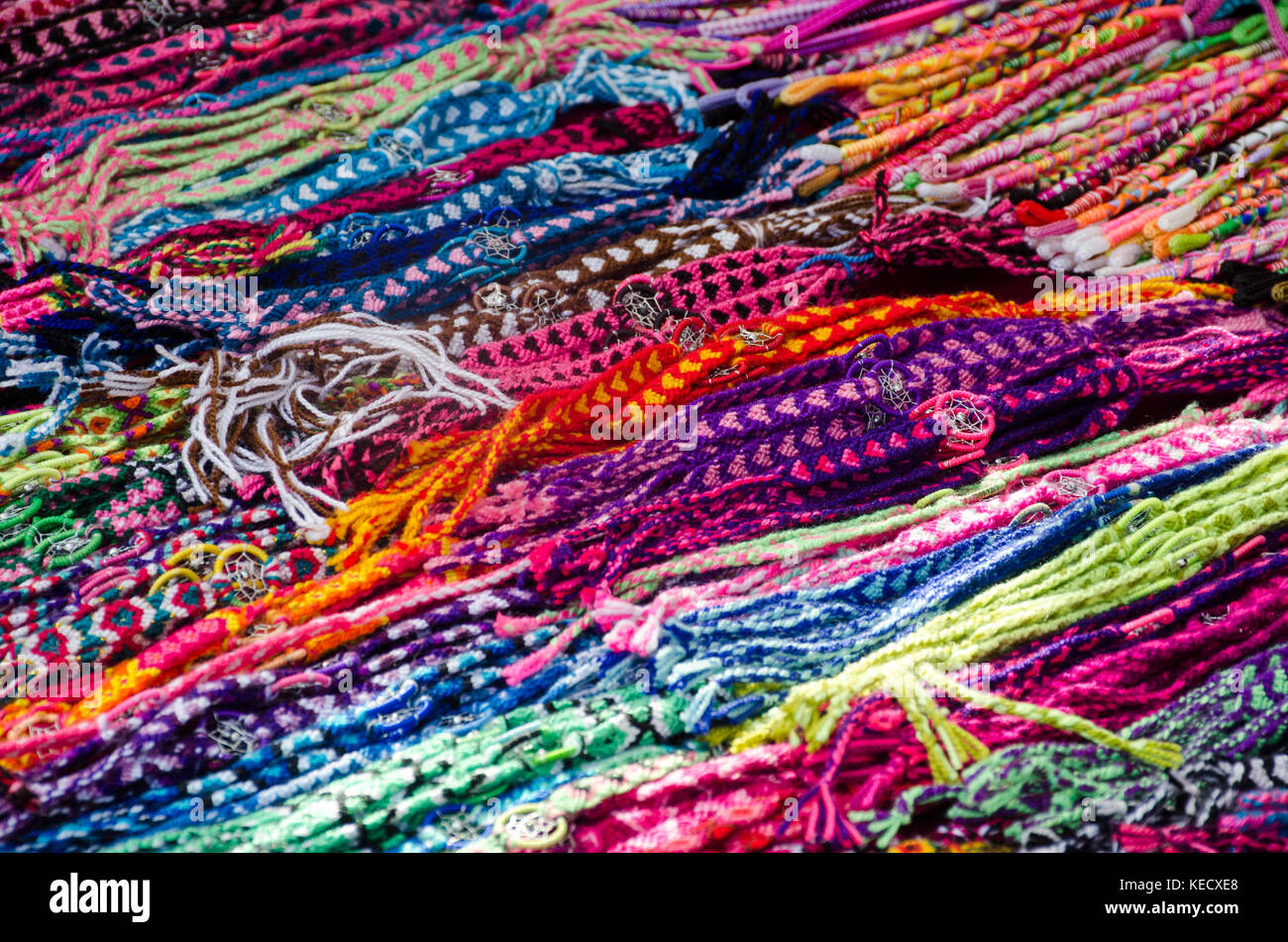 Bright Multicolored string in rows Stock Photo - Alamy
