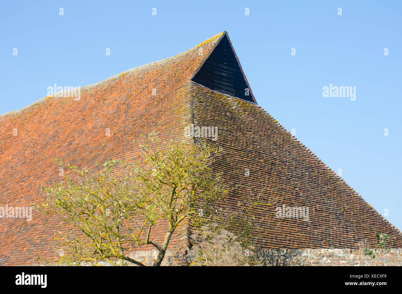 Roof of ancient barn with sky in background Stock Photo - Alamy