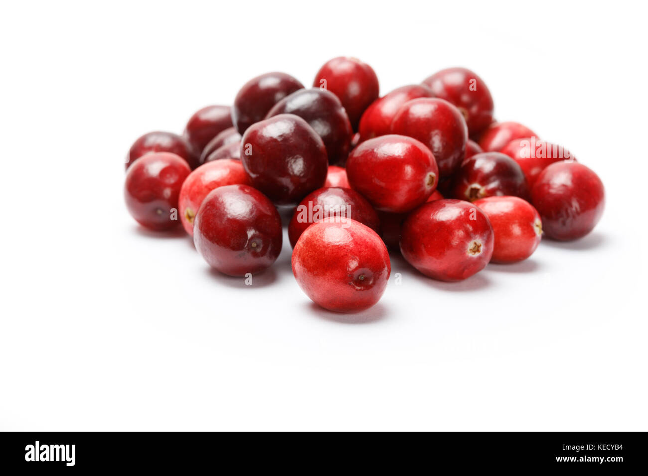 Red fresh raw cranberry isolated on white background Stock Photo - Alamy
