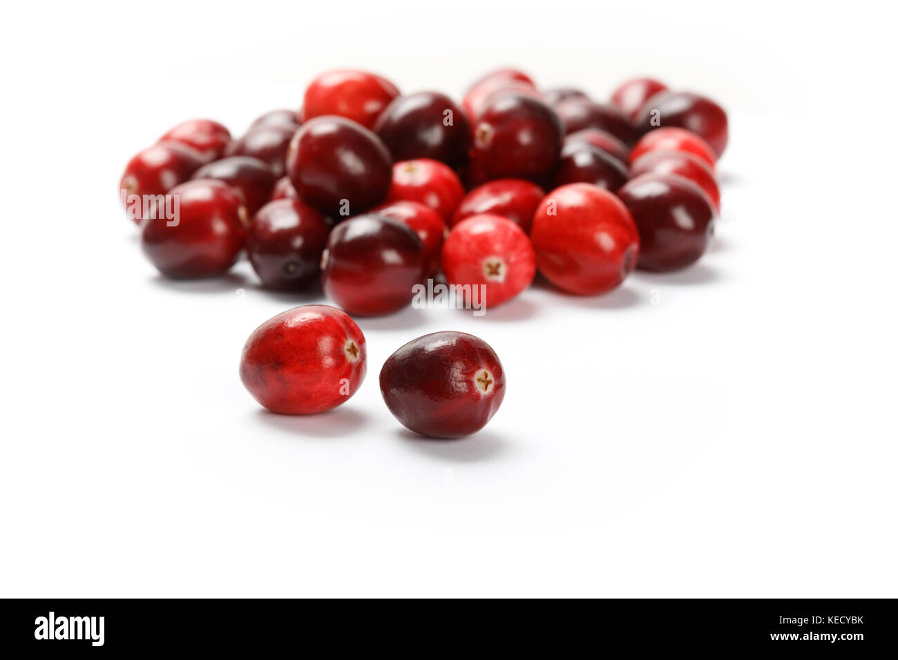 Red fresh raw cranberry isolated on white background Stock Photo - Alamy