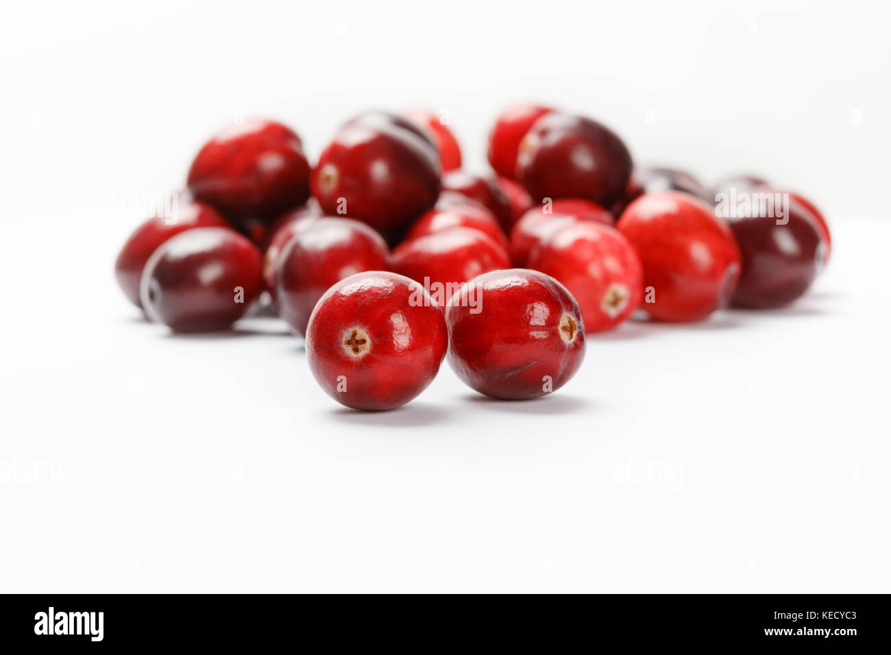 Red fresh raw cranberry isolated on white background Stock Photo - Alamy