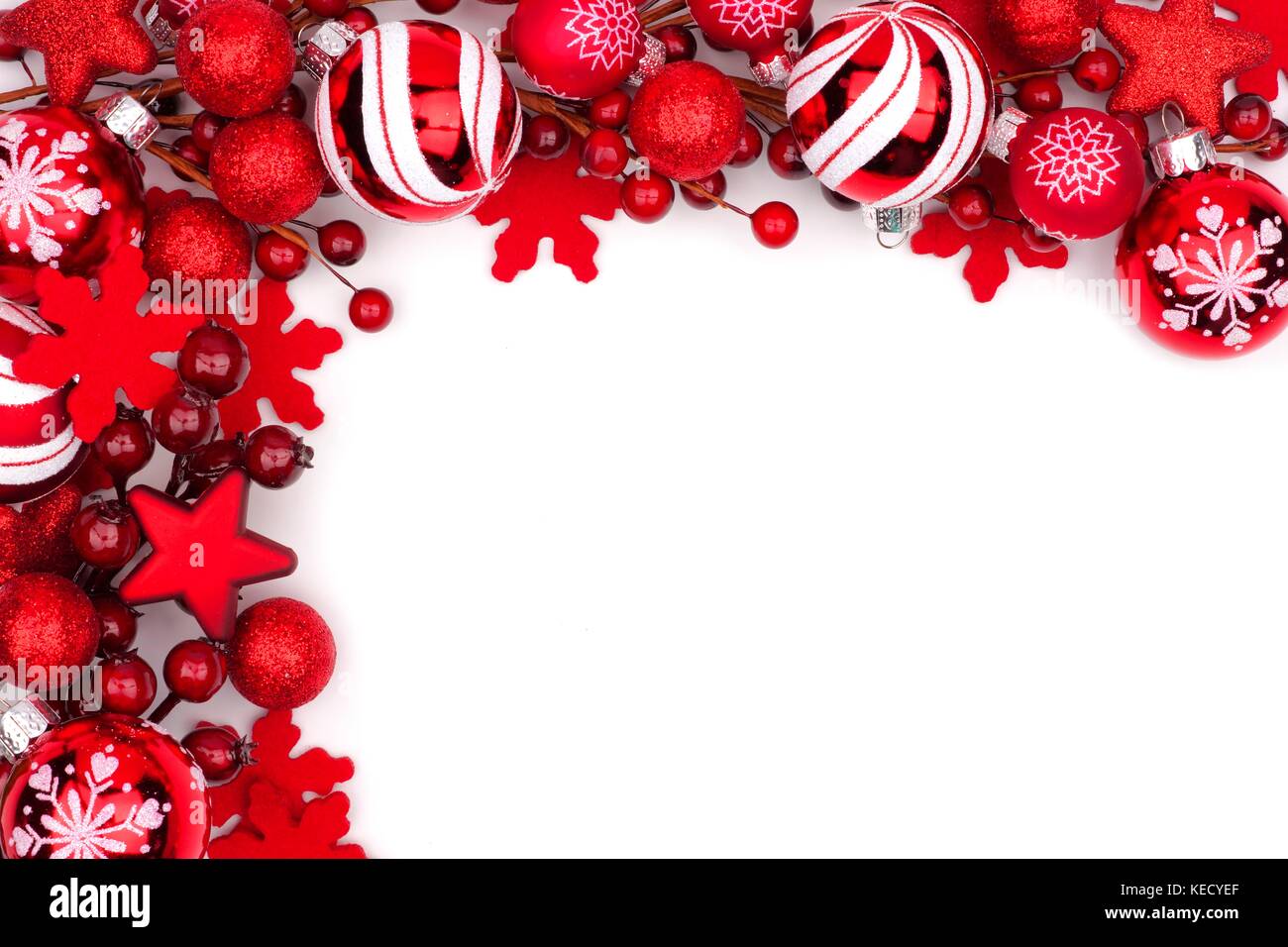 Christmas corner border of red ornaments isolated on a white background ...