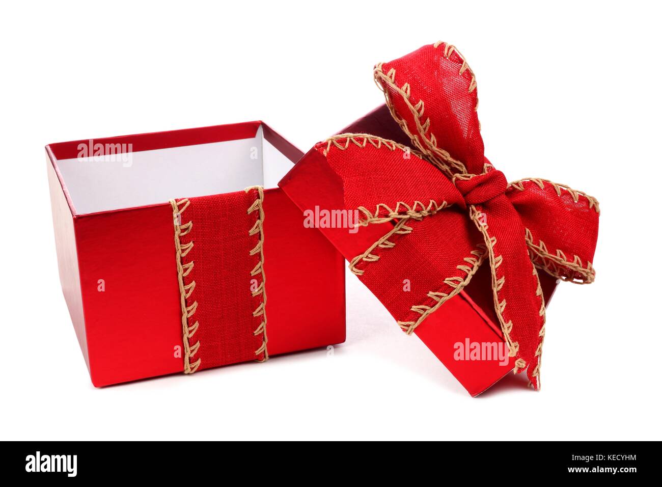 Opened red gift box wrapped with rustic red bow and ribbon isolated on ...