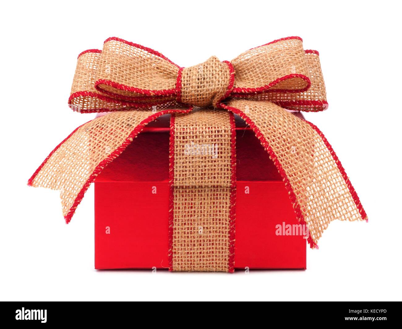Red gift box wrapped with rustic burlap bow and ribbon isolated on ...