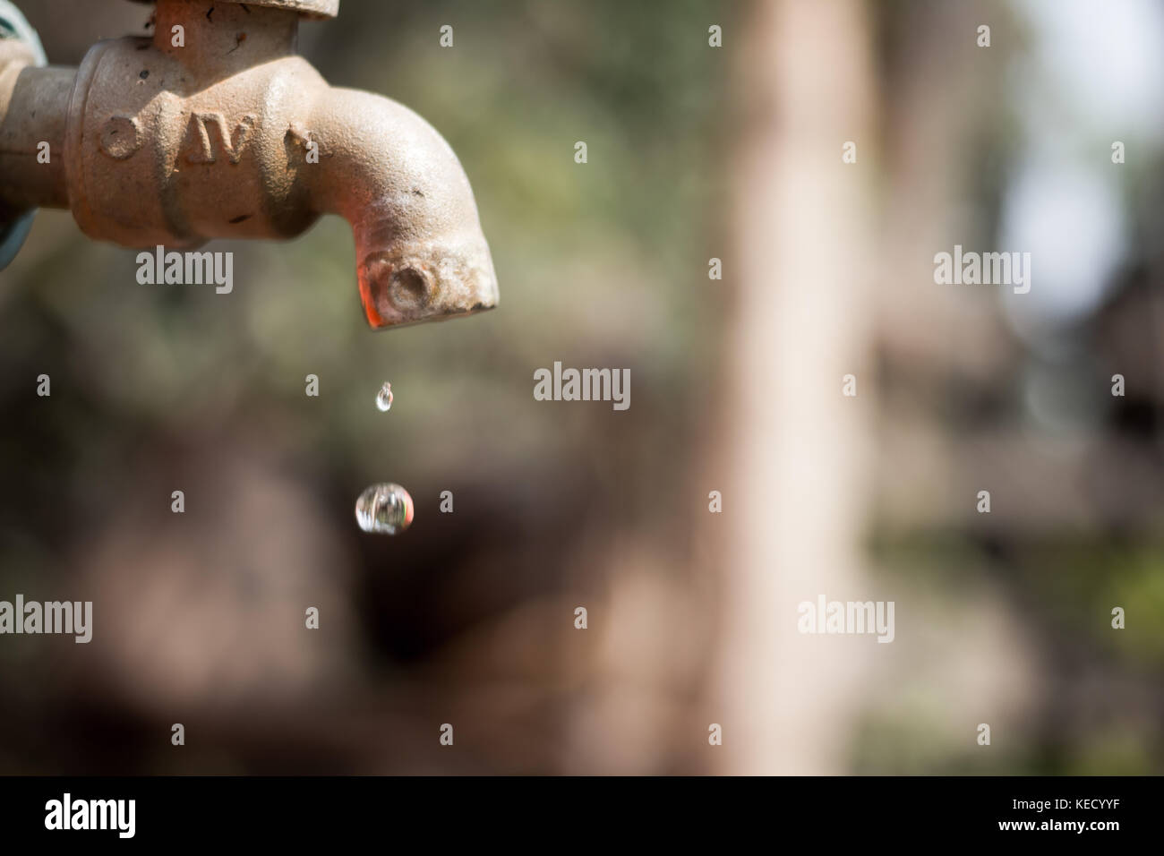 old rusty tap leaking water Stock Photo - Alamy