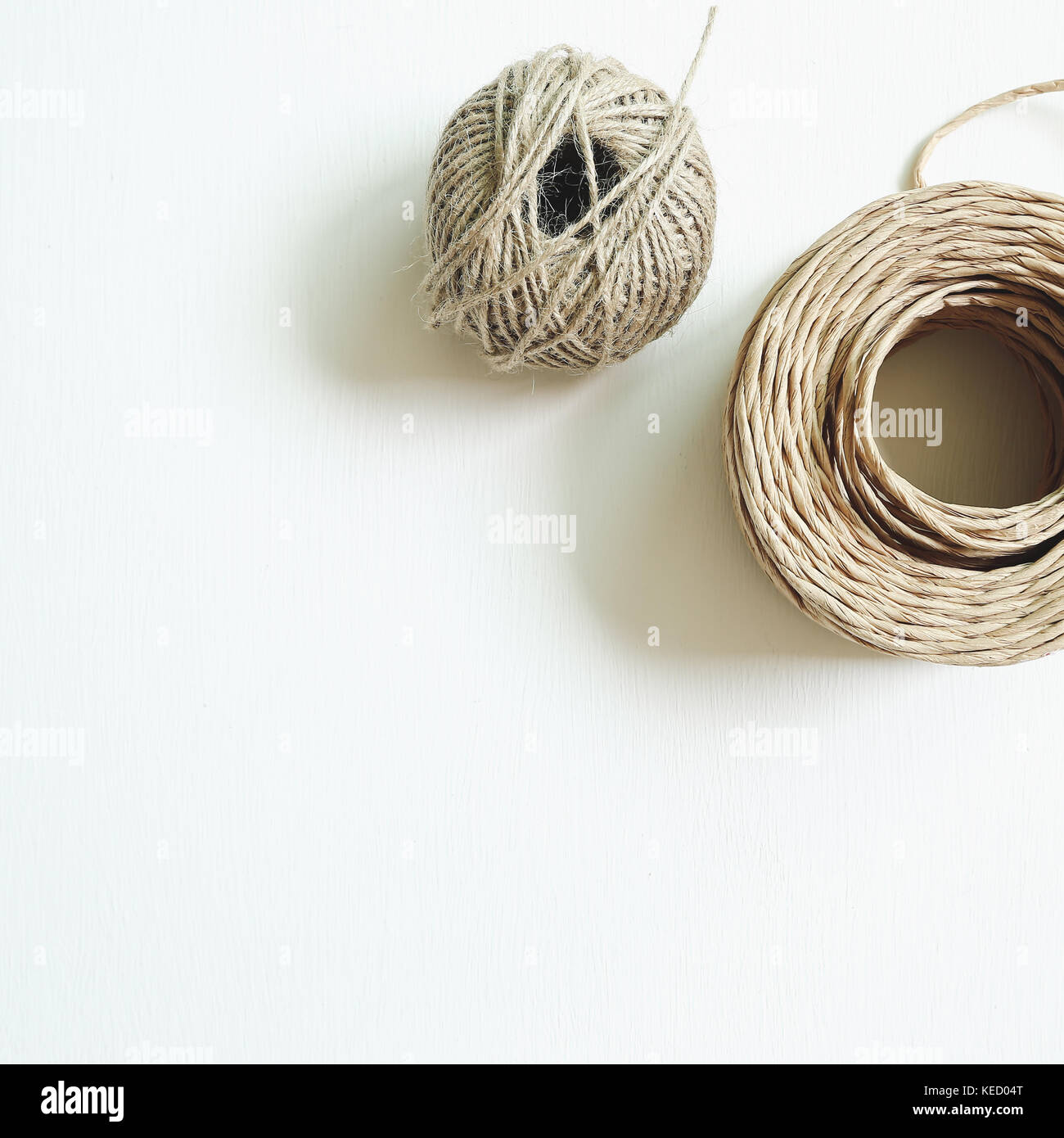 Brown string isolated on white background Stock Photo - Alamy