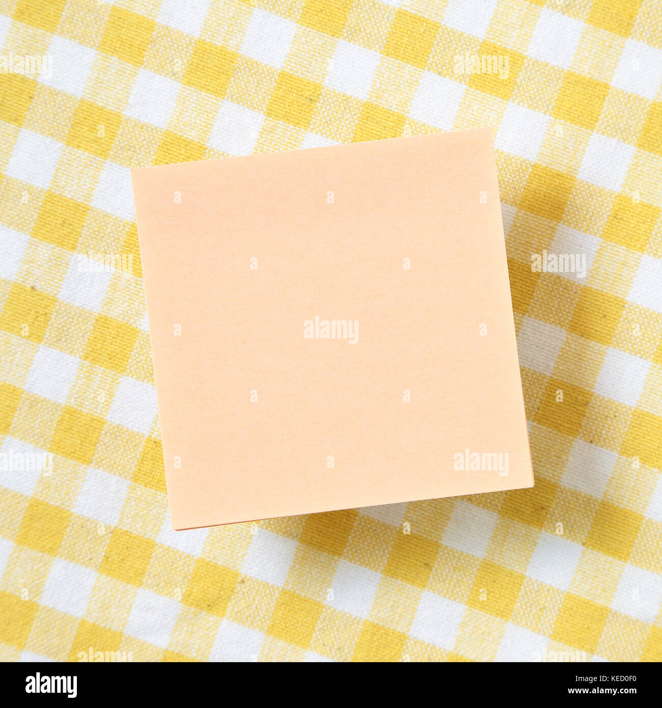 Reminder sticky notes on yellow check pattern fabric background Stock ...