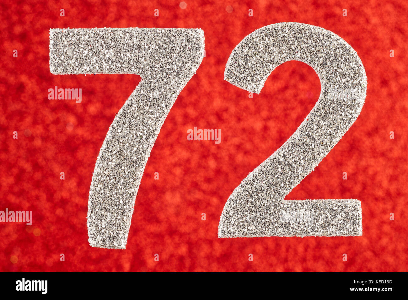 Number seventy-two silver color over a red background. Anniversary ...