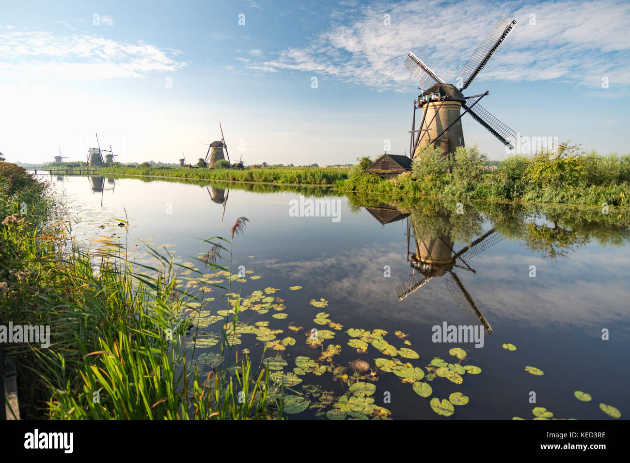 Windmill with reflection Stock Photo - Alamy