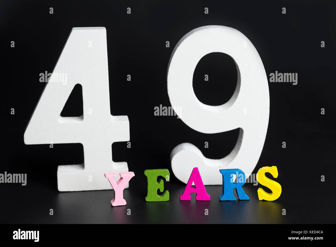 Letters and numbers-forty-nine on a black isolated background Stock ...