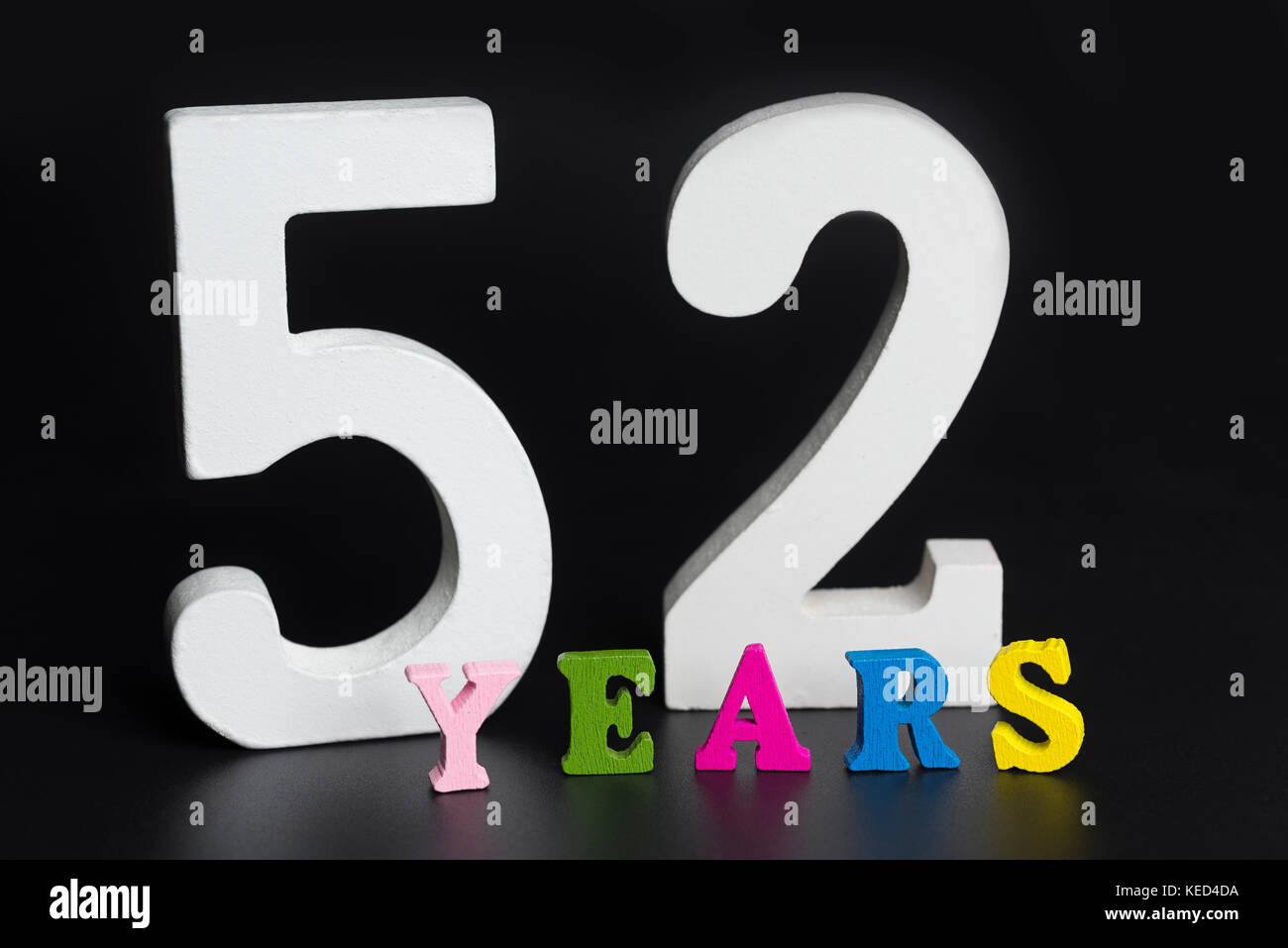 Letters and numbers-fifty-two on a black isolated background Stock ...