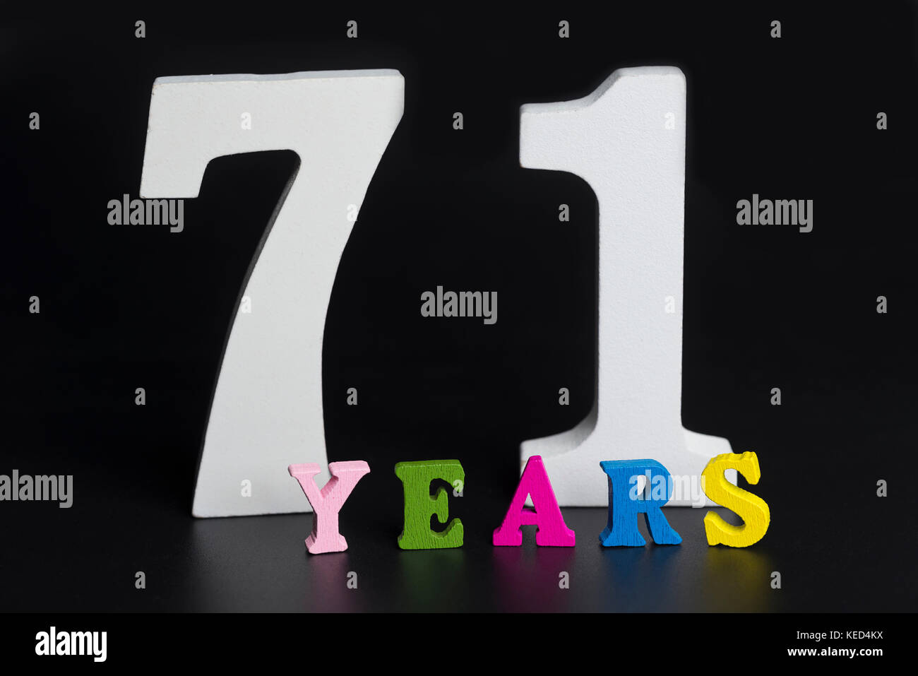 Letters and numbers-seventy-one on black isolated background Stock ...