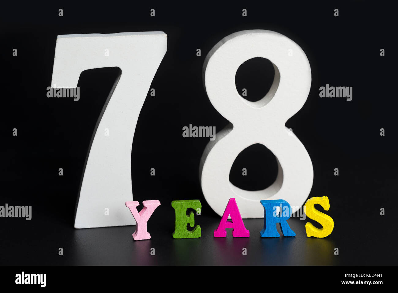 Letters and numbers-seventy eight on a black isolated background Stock ...
