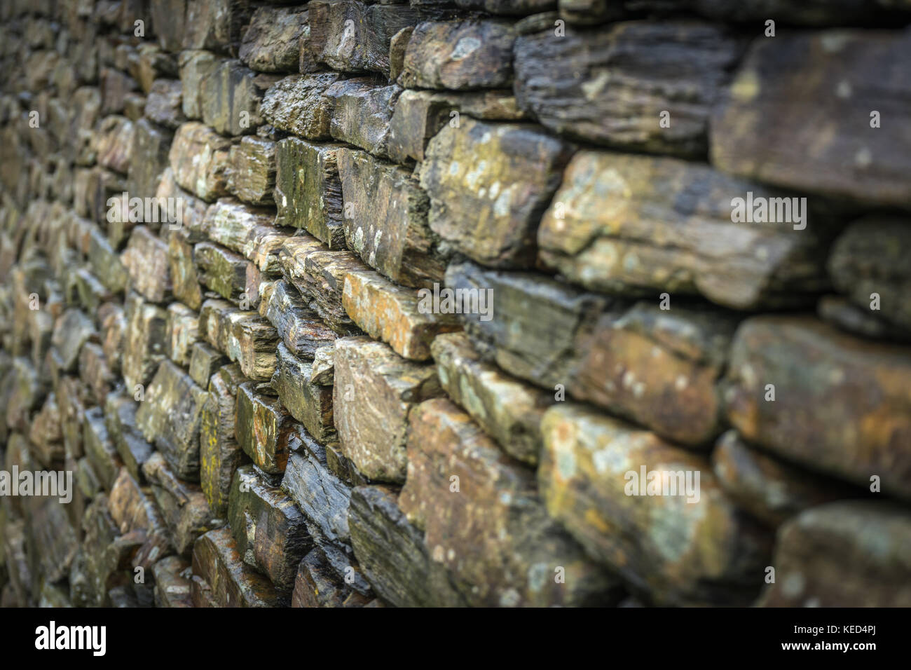 Layers of natural stone make up a 'Dry Stone Wall', a tradional method ...