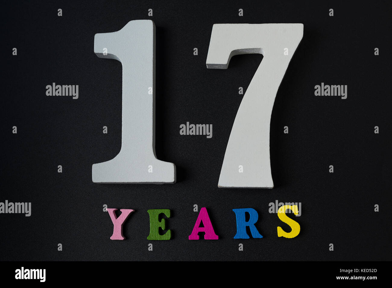 Letters and numbers seventeen on a black isolated background Stock ...