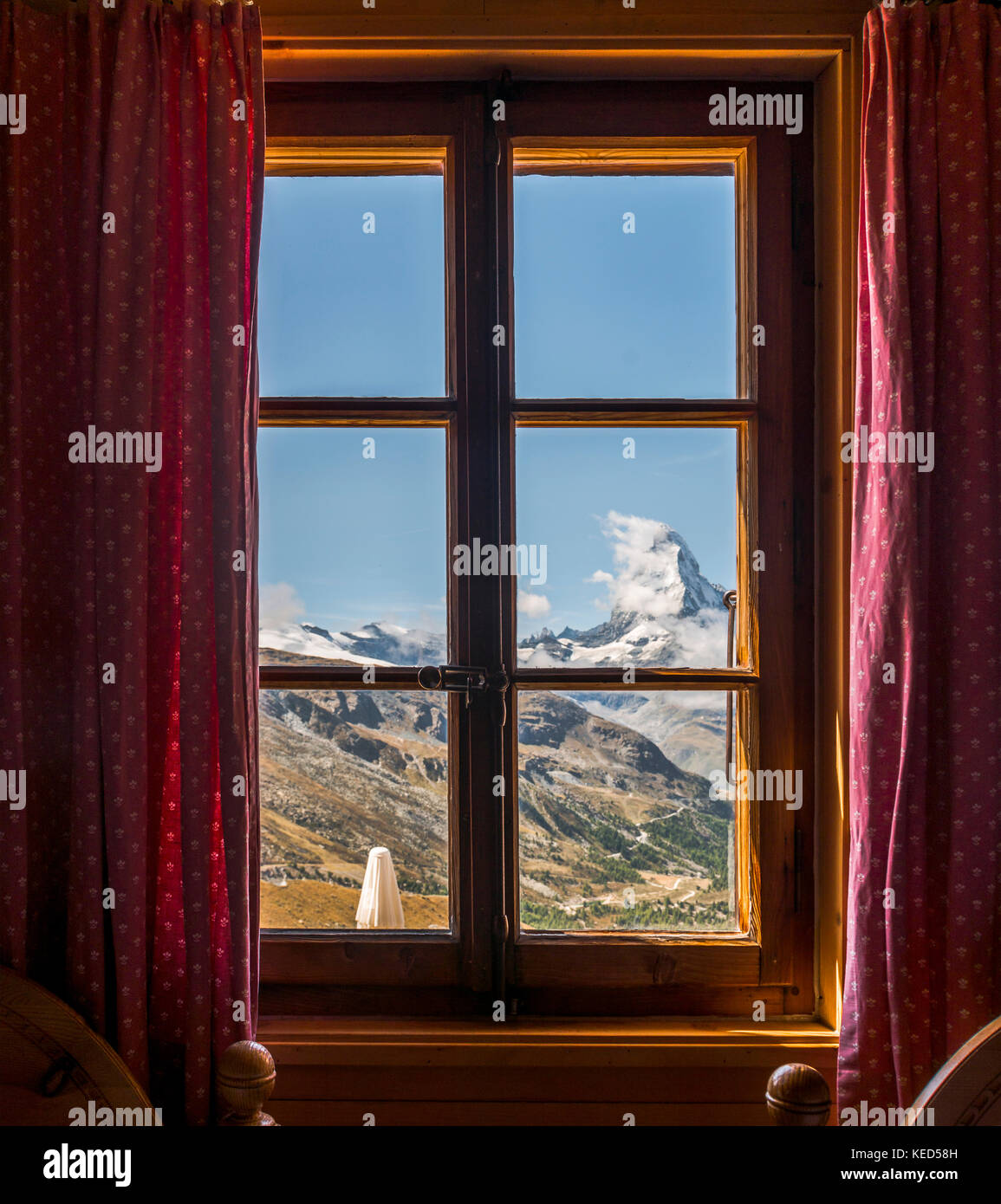View from the window to snow-covered Matterhorn, Fluhalp mountain lodge ...