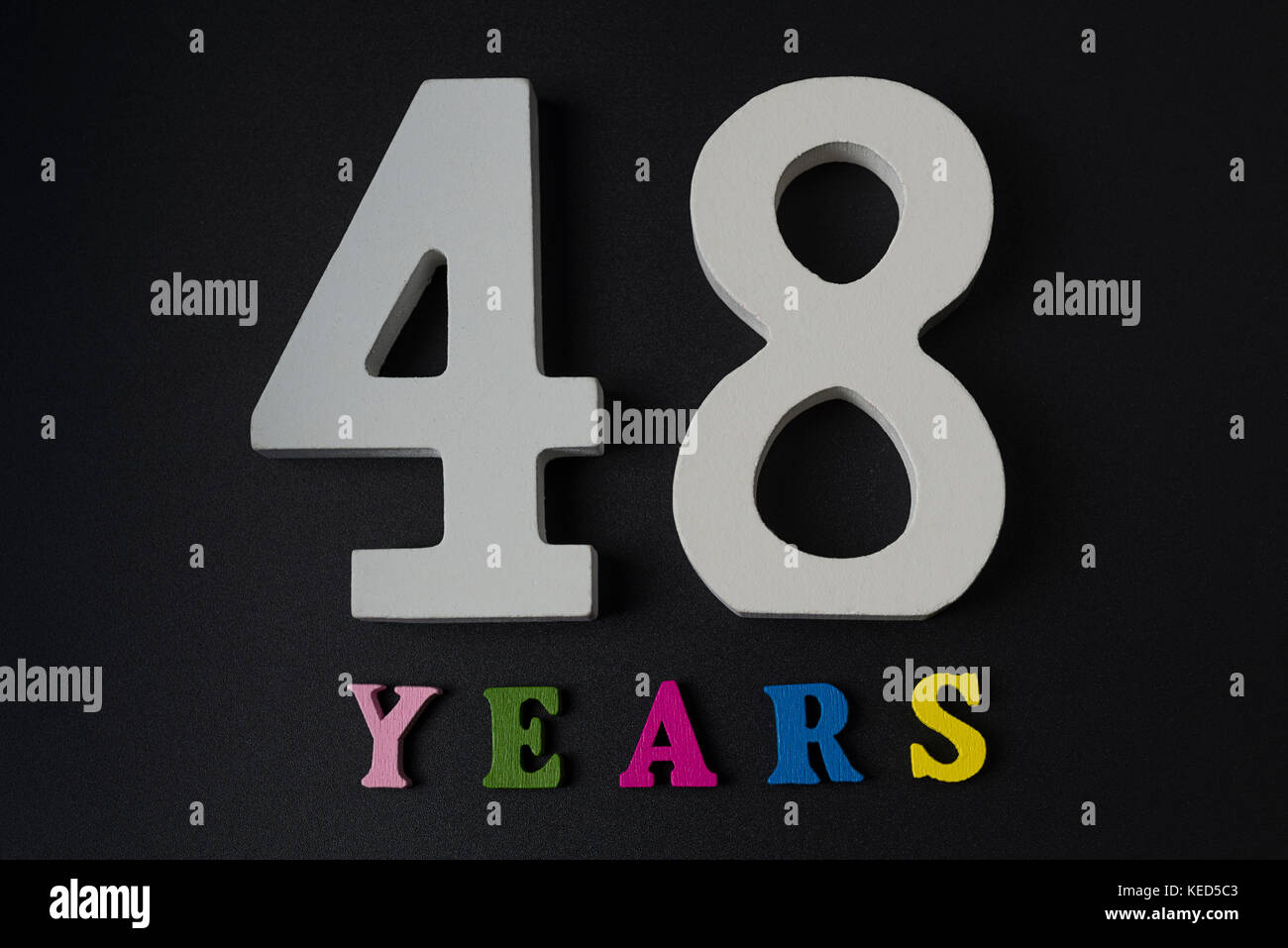 Letters and numbers-forty-eight on a black isolated background Stock ...
