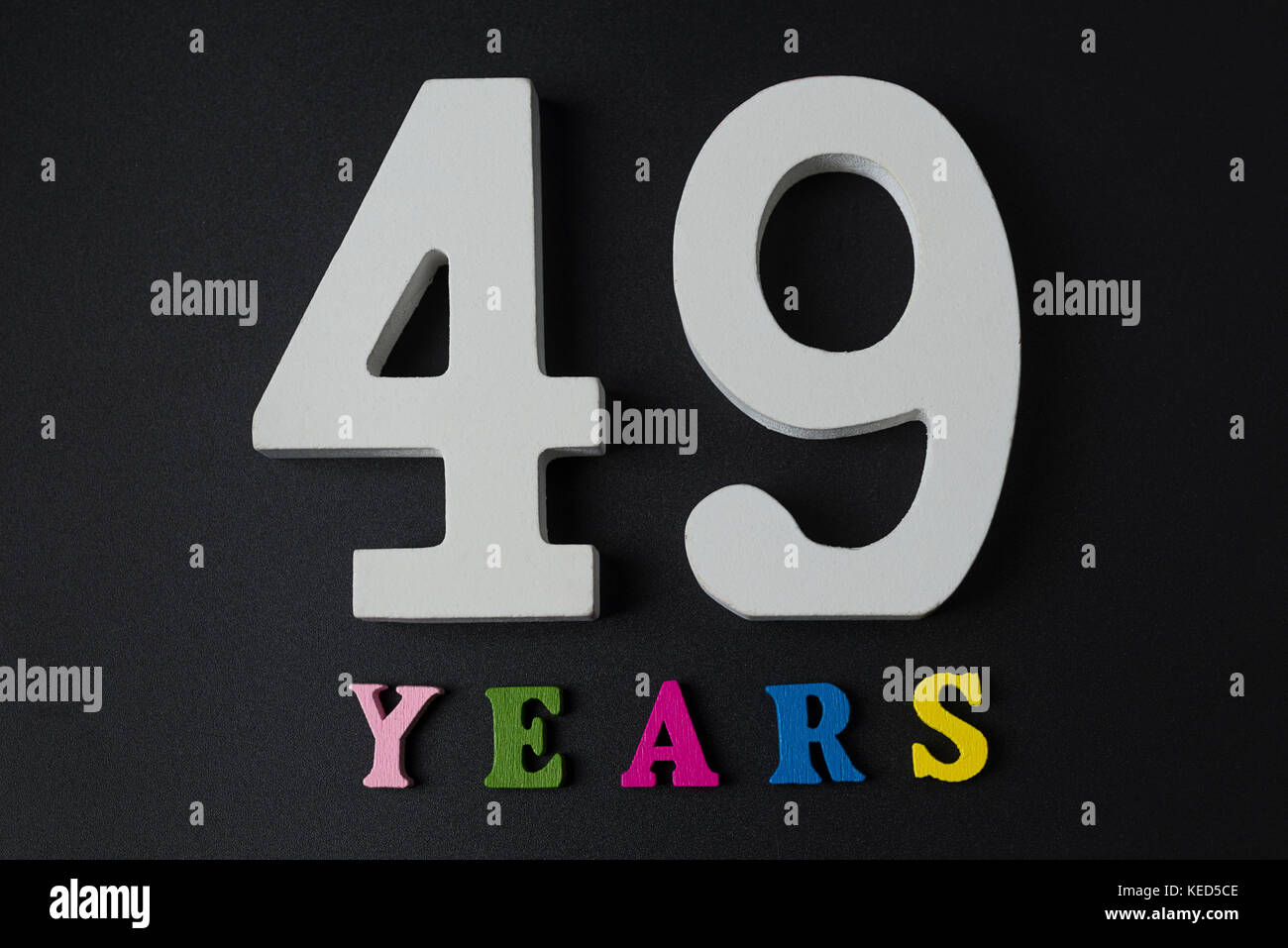 Letters and numbers-forty-nine on a black isolated background Stock ...