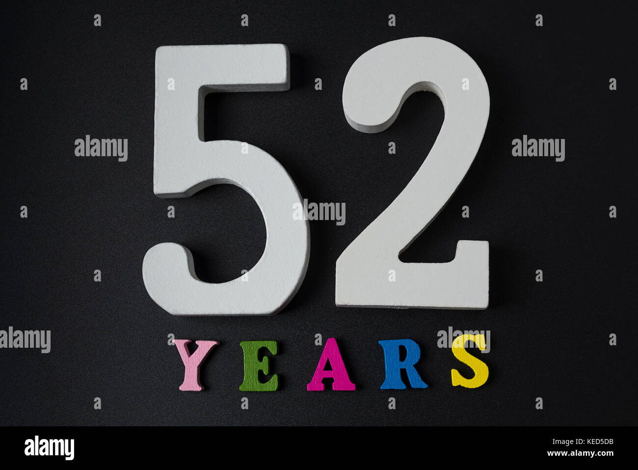 Letters and numbers-fifty-two on a black isolated background Stock ...
