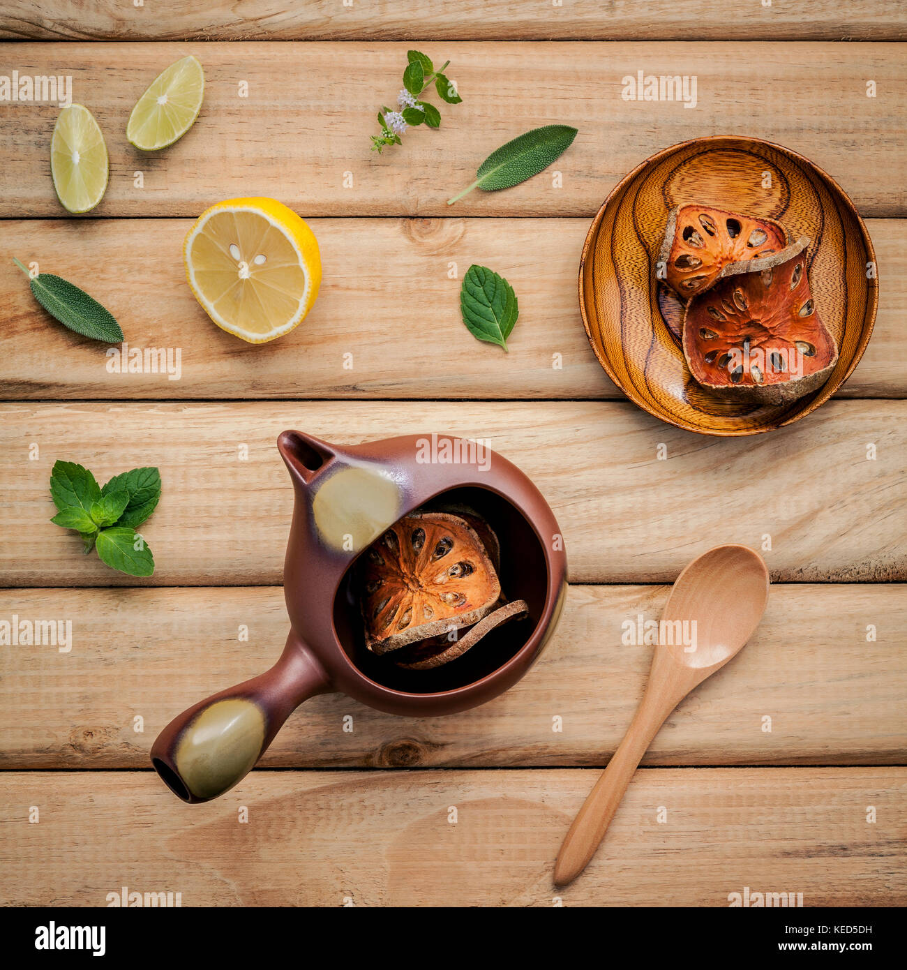 Herbal tea pot with fresh herbs sage ,peppermint ,dried indian bael ...