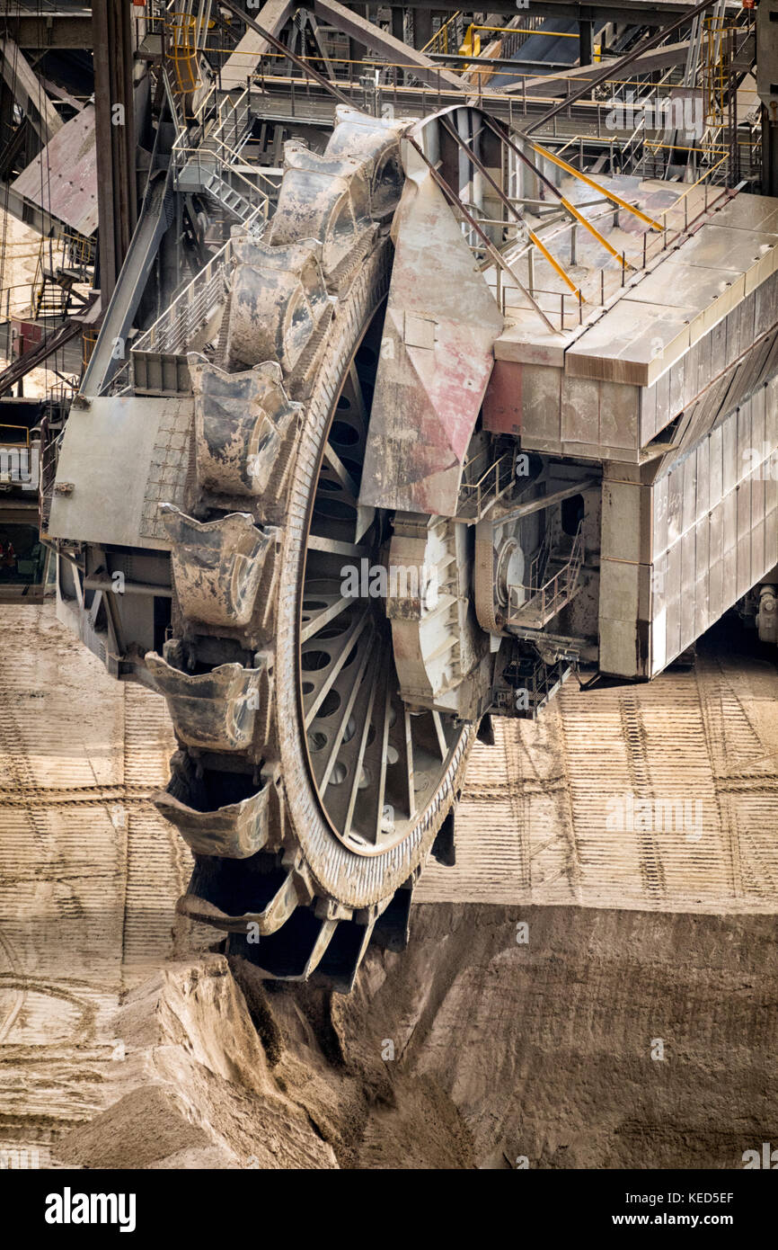 Huge bucket-wheel excavator mining lignite (brown-coal) in an open pit ...
