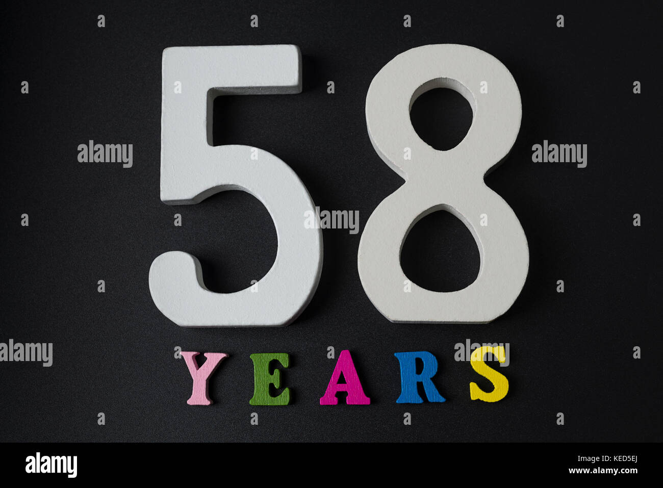 Letters and numbers fifty-eight on a black isolated background Stock ...