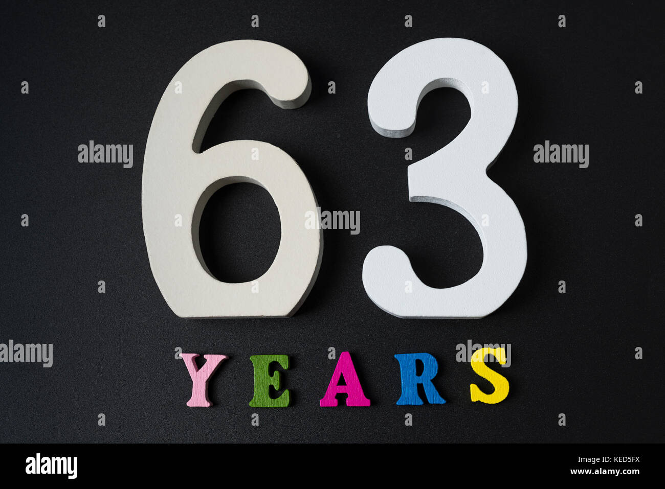 Letters and numbers-sixty-three on black isolated background Stock ...