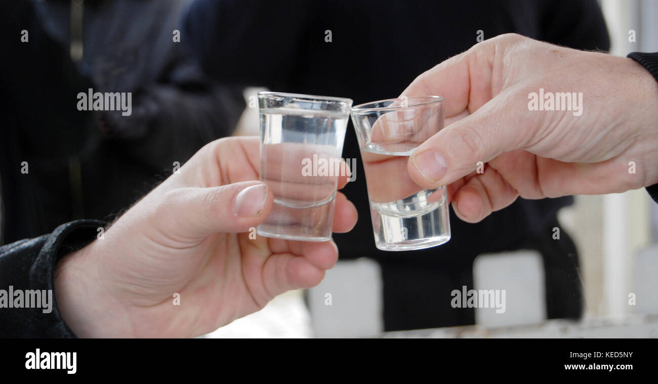 Cheers with rakia Stock Photo - Alamy