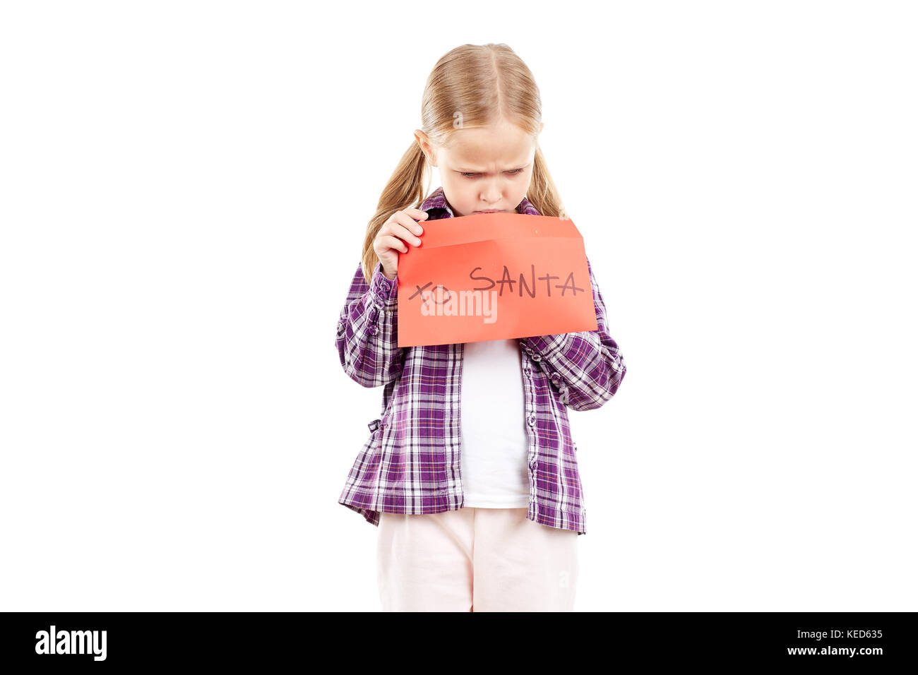 Holding letter to Santa Stock Photo - Alamy