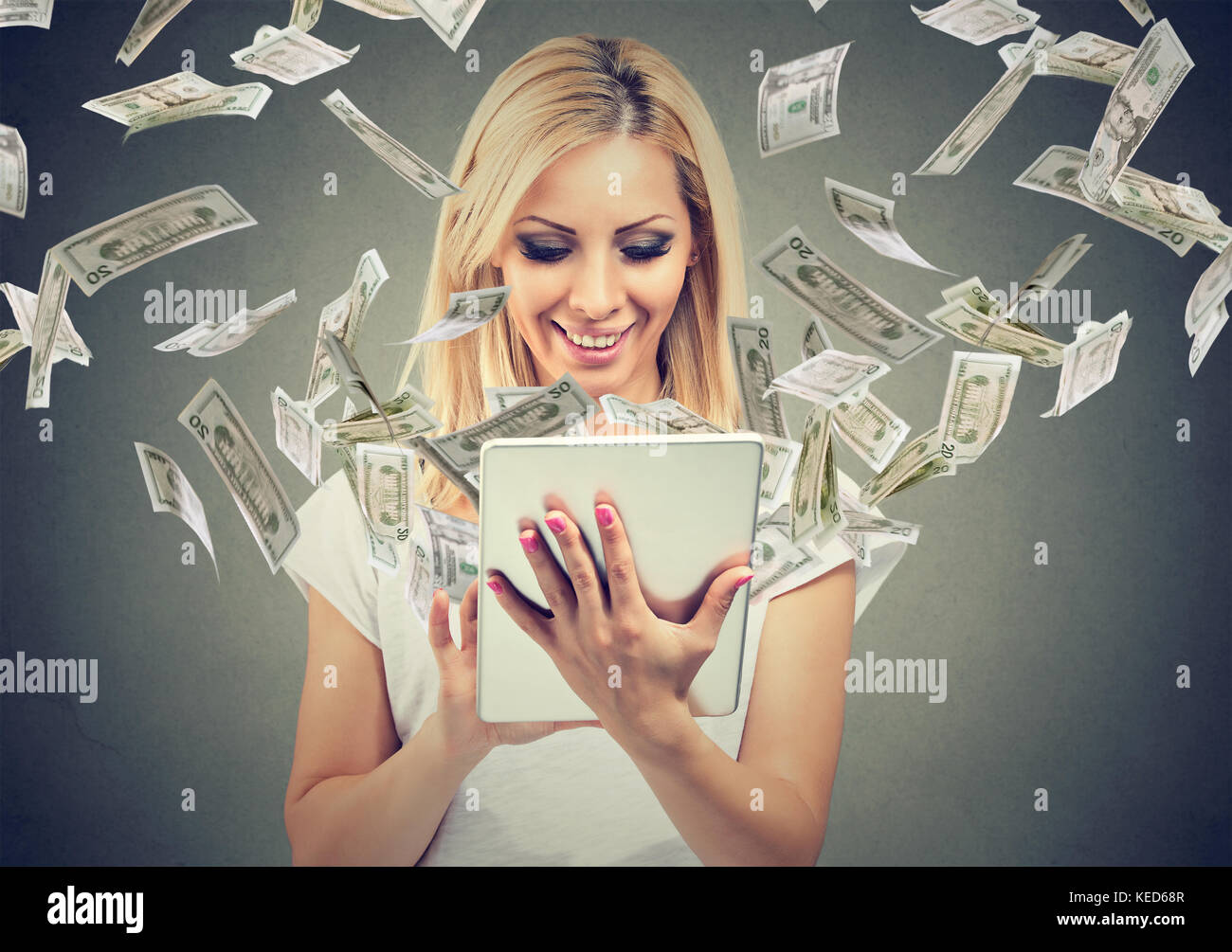 Online banking money transfer, e-commerce concept. Happy young woman ...