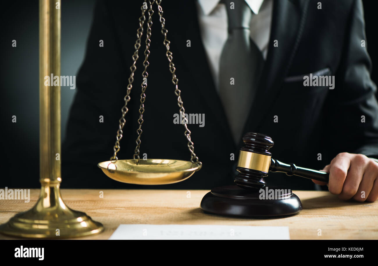 judge with a gavel and the justice scale Stock Photo - Alamy