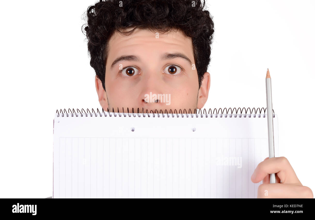 Close up of a young student holding notebook and pencil. Isolated white ...
