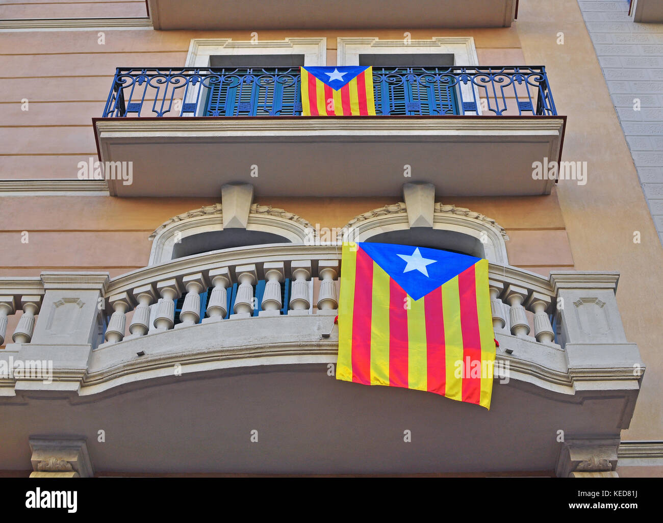 Barcelona house with flags of Catalonia Stock Photo - Alamy