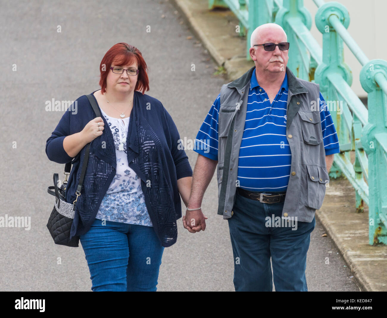 A couple with a large age difference holding hands Stock Photo - Alamy