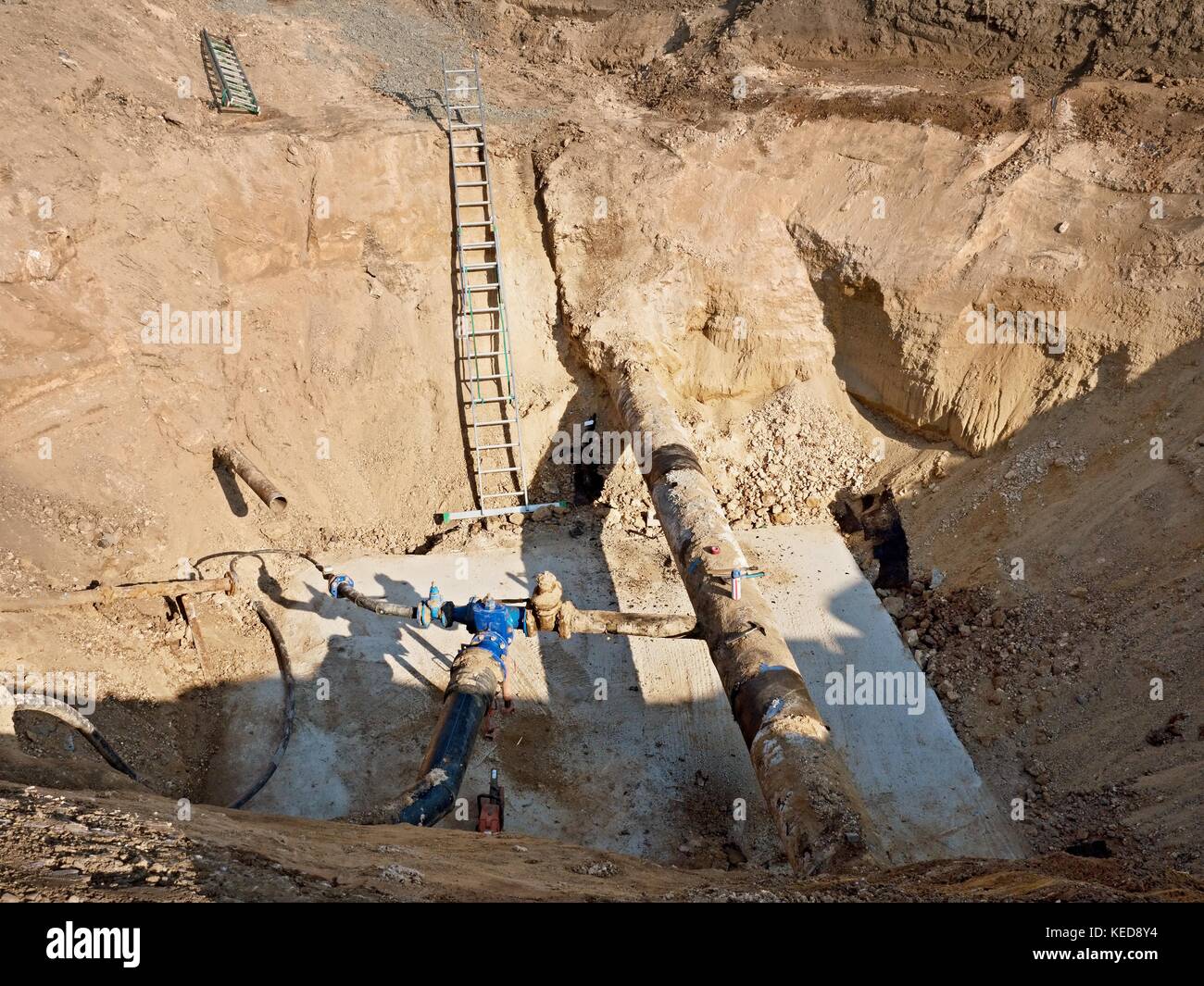 Excavation pit. Old 500mm drink water pipe with 150mm cornering arm ...