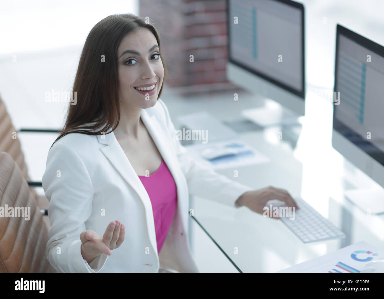 successful business woman smiling customer Stock Photo - Alamy