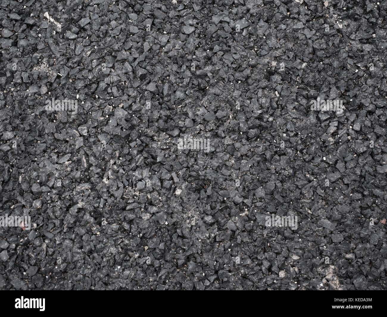Flexible tile for playground. Tiles made from a mixture of rubber crumb ...