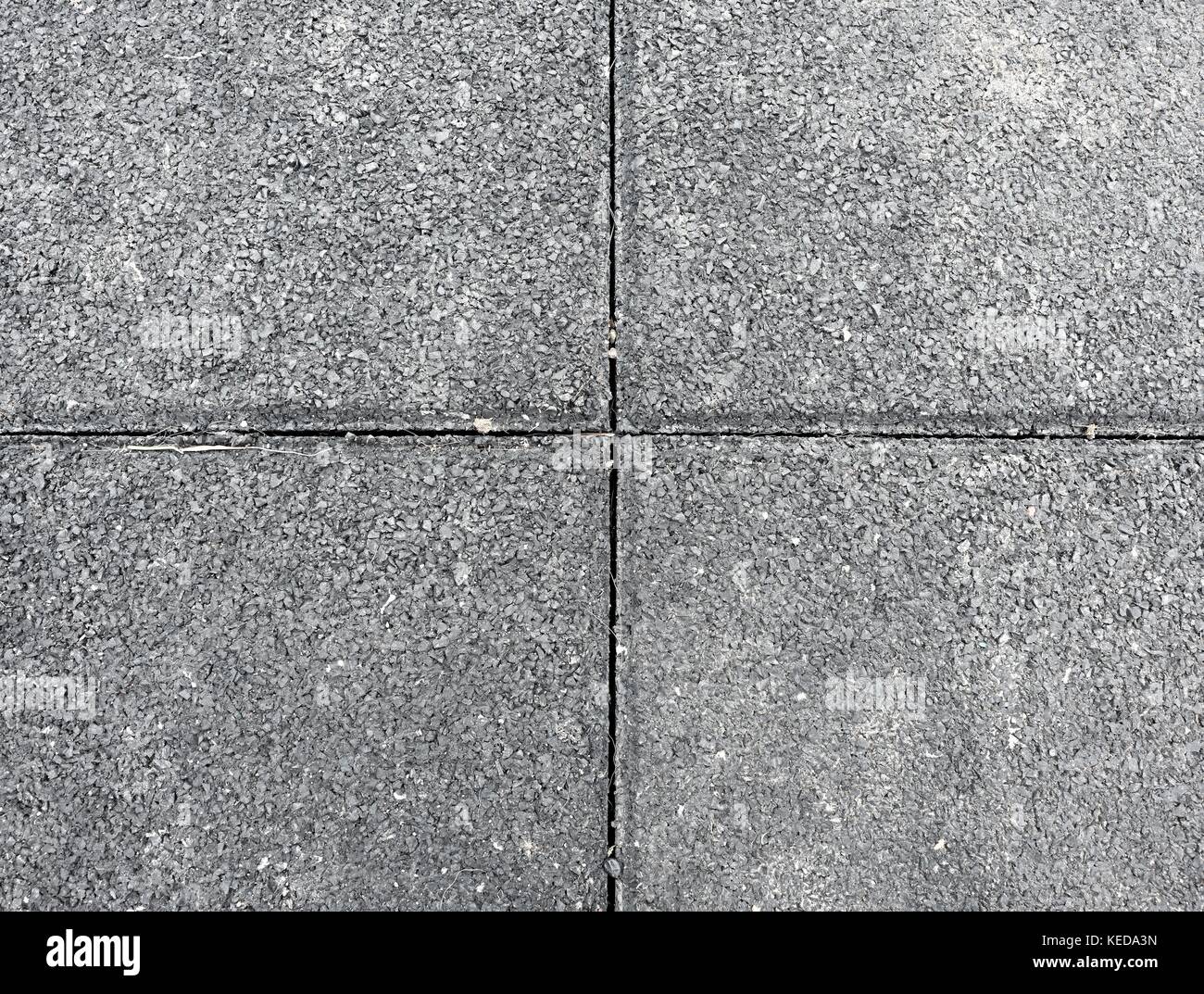 Flexible tile for playground. Tiles made from a mixture of rubber crumb ...
