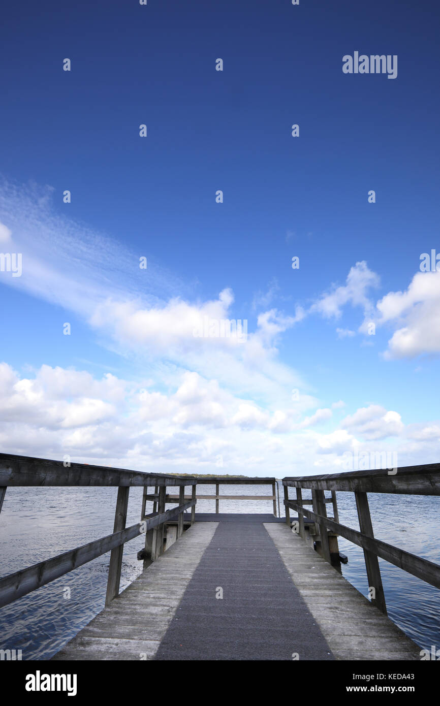 marine jetty pier with sea and beautiful sky and clouds Stock Photo - Alamy
