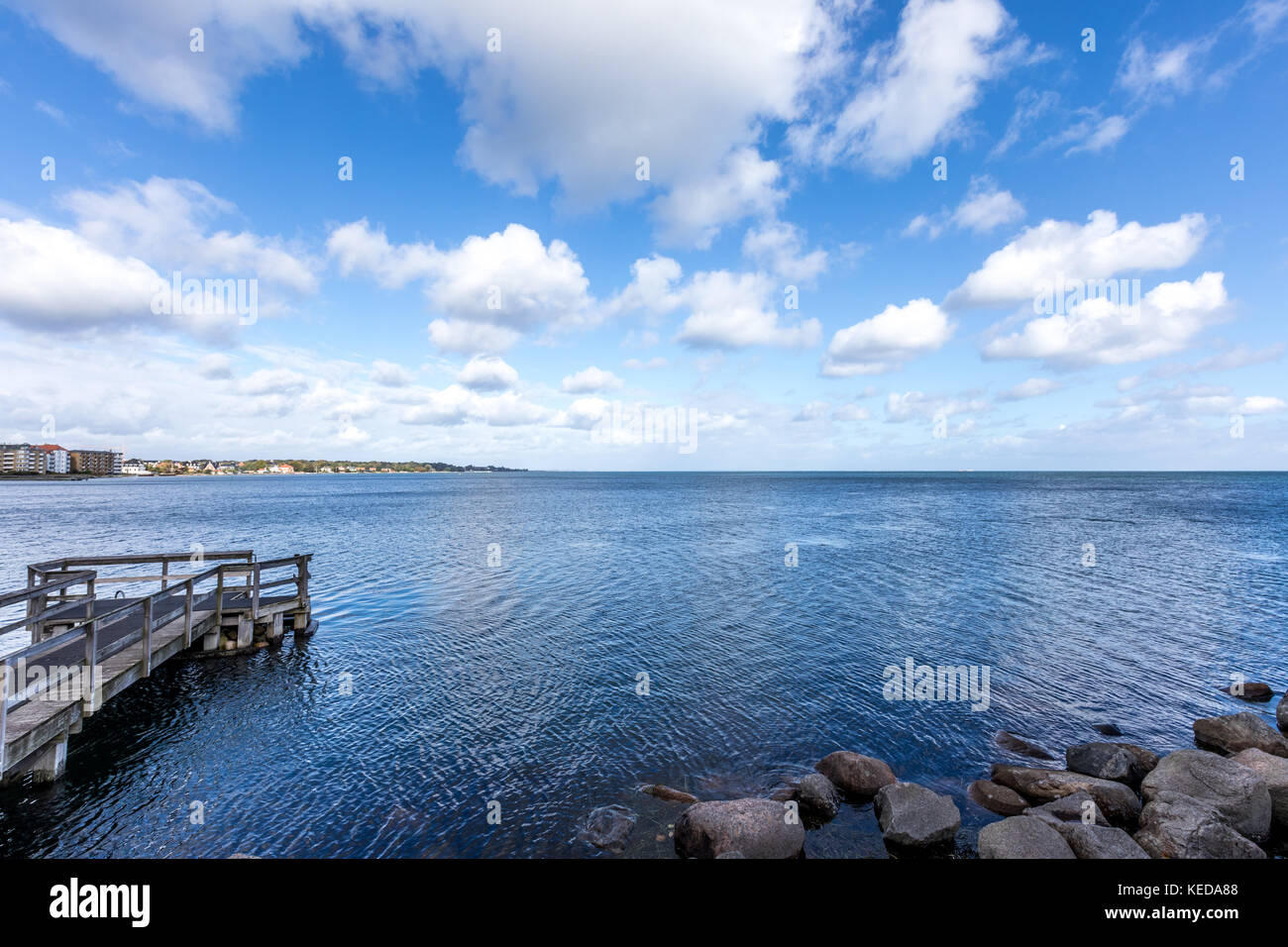 marine jetty pier with sea and beautiful sky and clouds Stock Photo - Alamy
