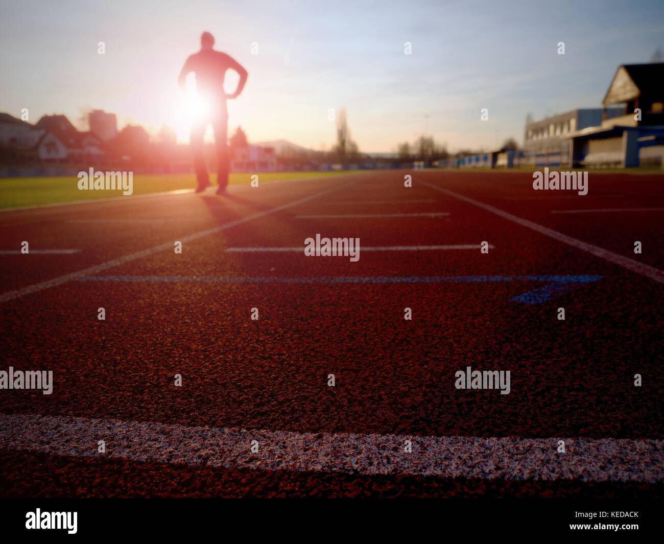 Marathon man training. Sportsman in running clothes on stadium at ...