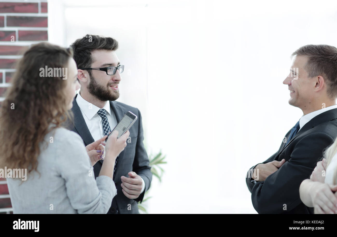 business partners communicating before the start of the official ...